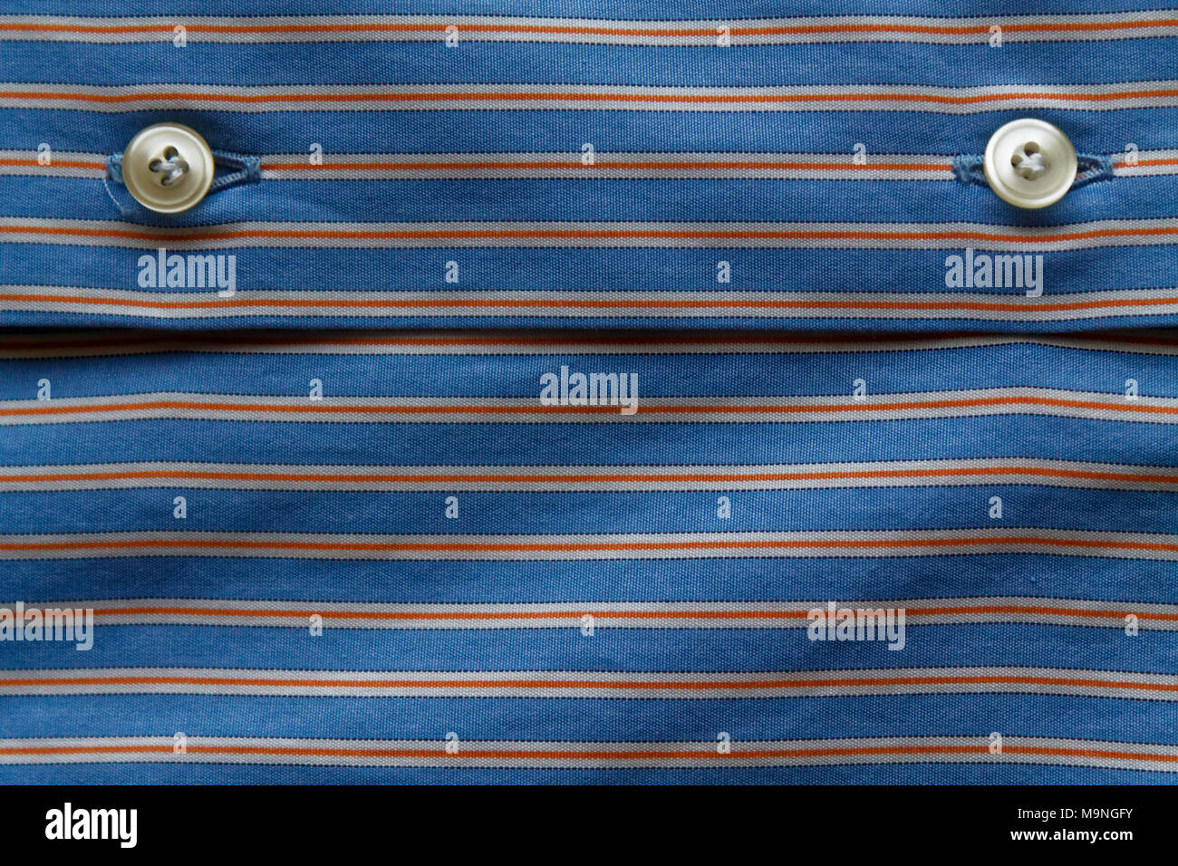 Part of blue striped shirt with buttons texture or background Stock ...