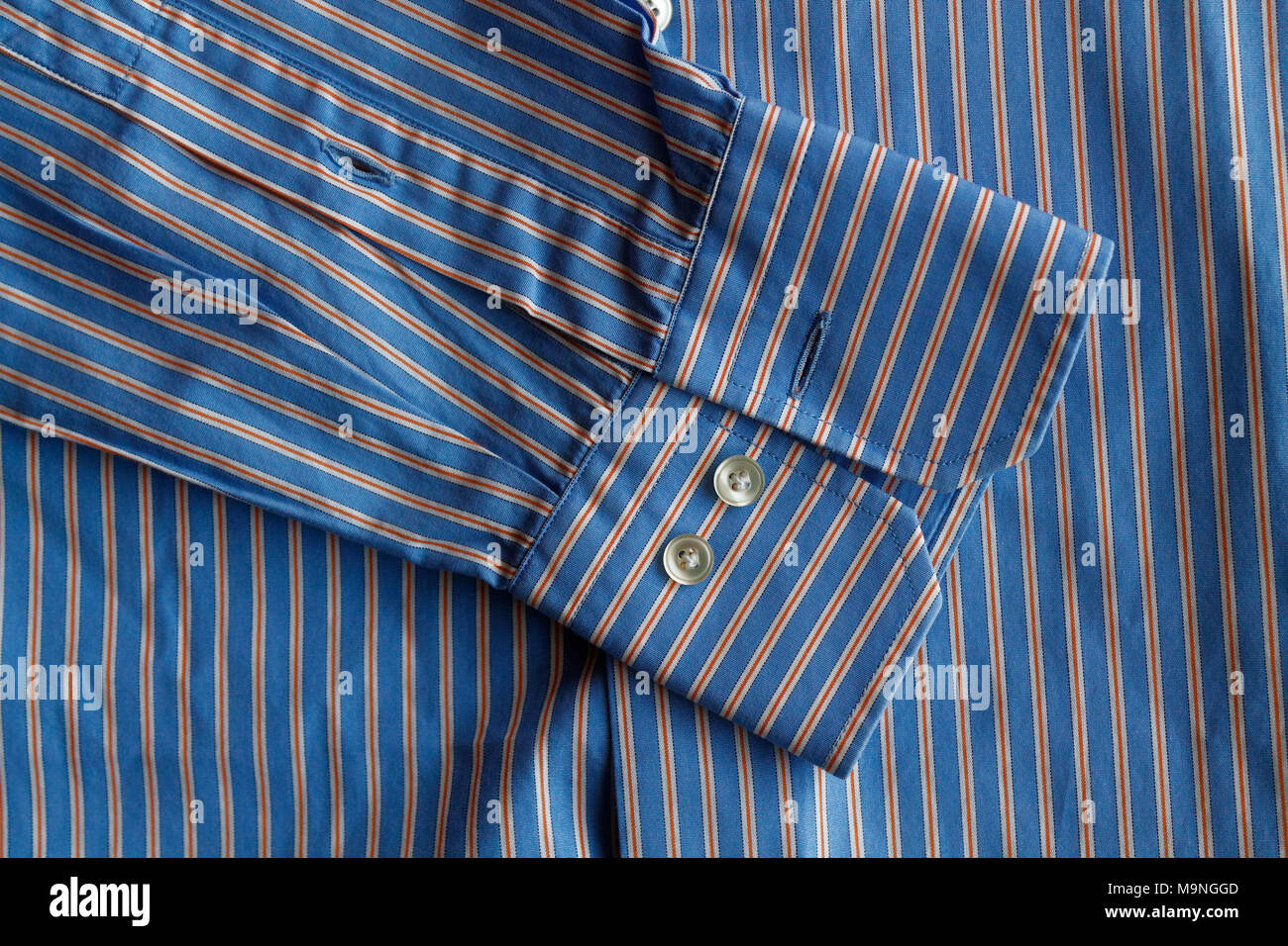 Part of blue striped shirt with buttons texture or background Stock ...