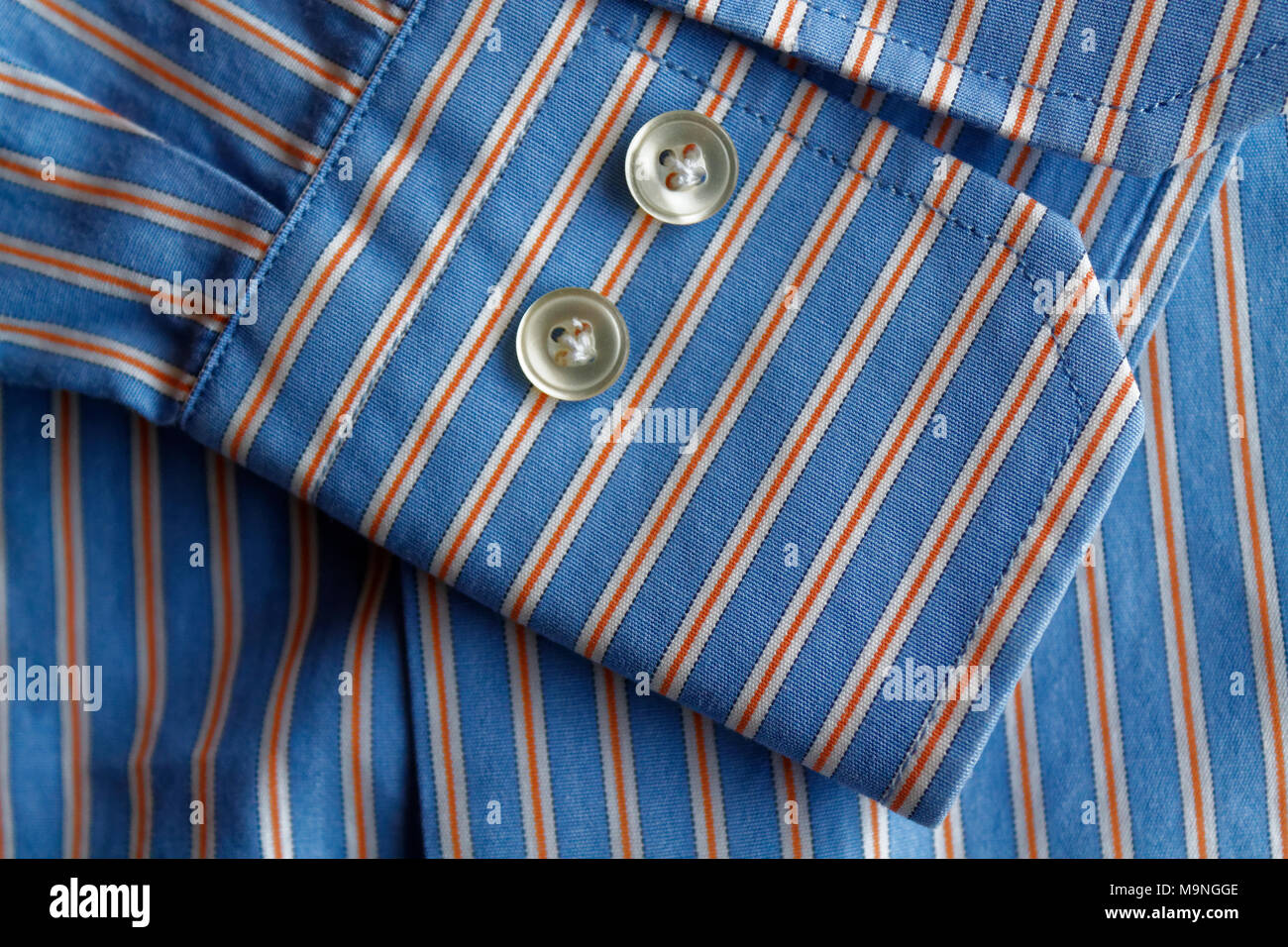 Part of blue striped shirt with buttons texture or background Stock ...
