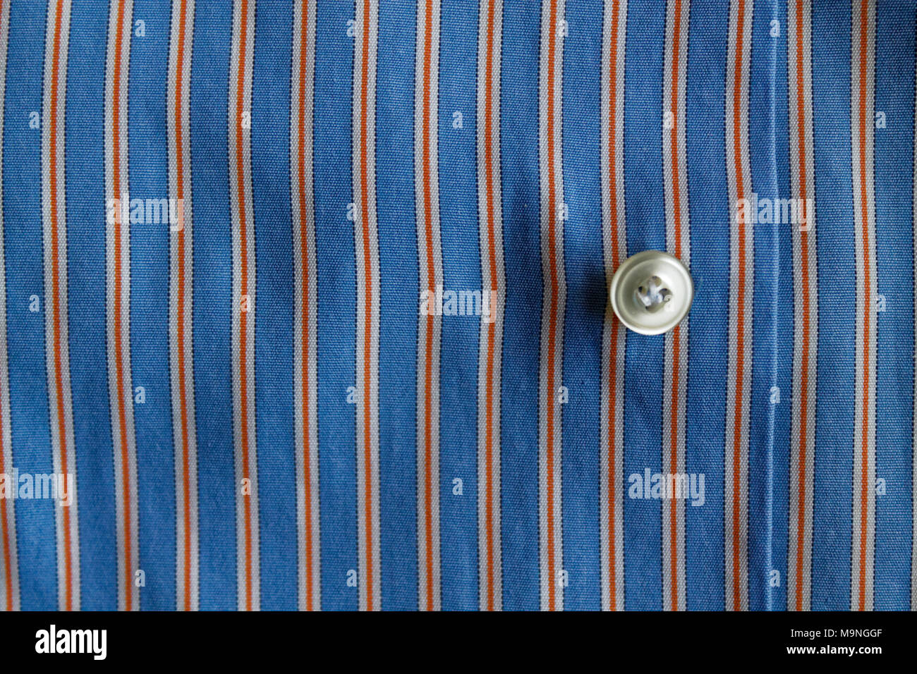 Part of blue striped shirt with buttons texture or background Stock ...