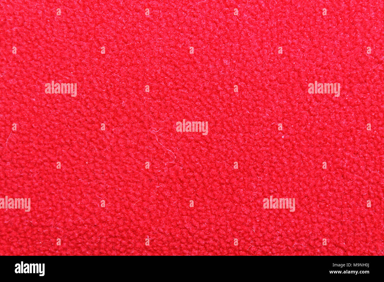 Fabric red colored texture or background Stock Photo - Alamy