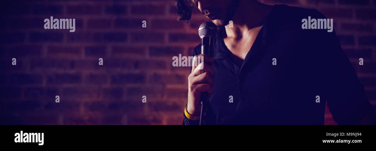 Microphone brick wall hi-res stock photography and images - Alamy