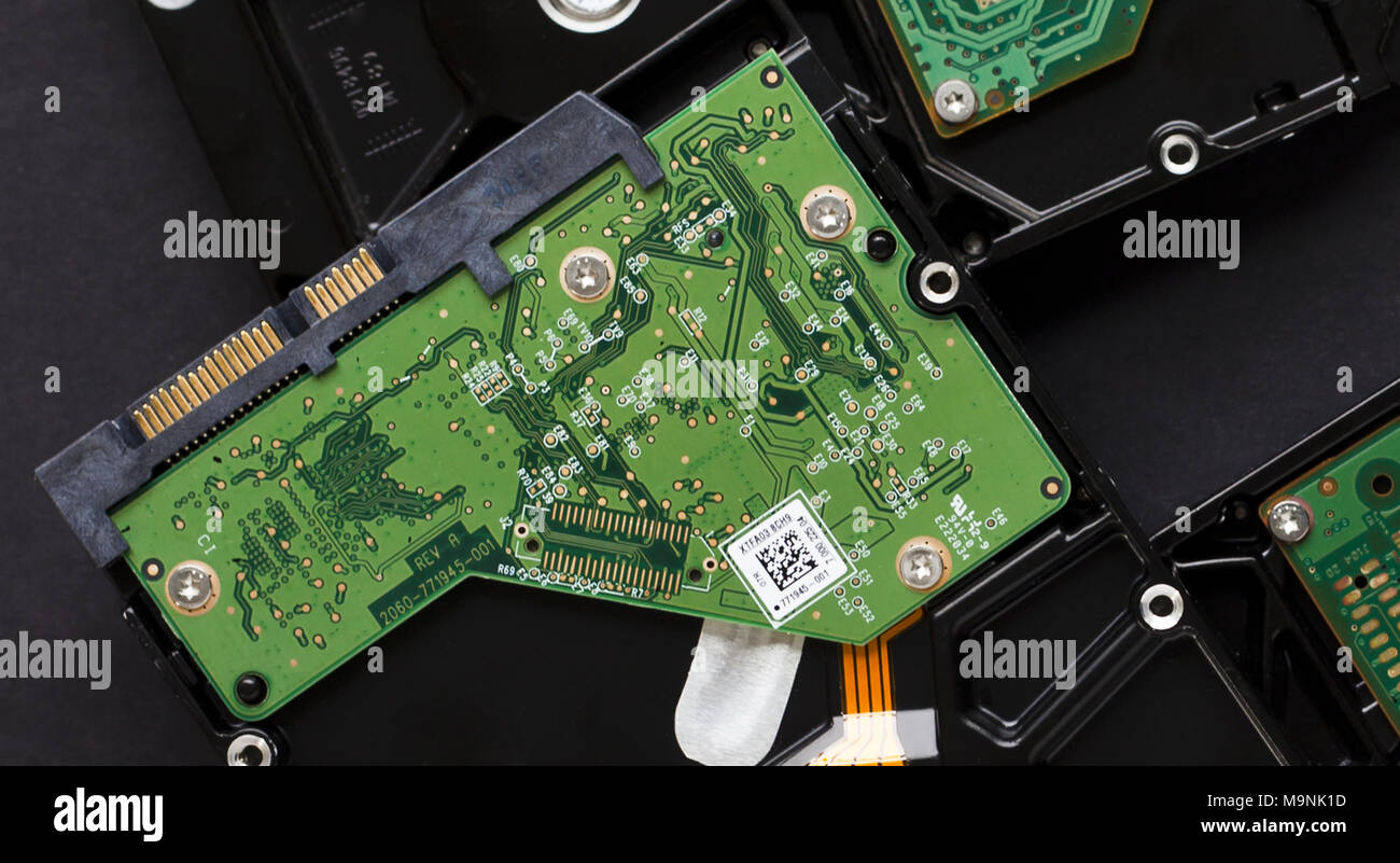 Several hard drives showing circuit boards and connectors Stock Photo ...