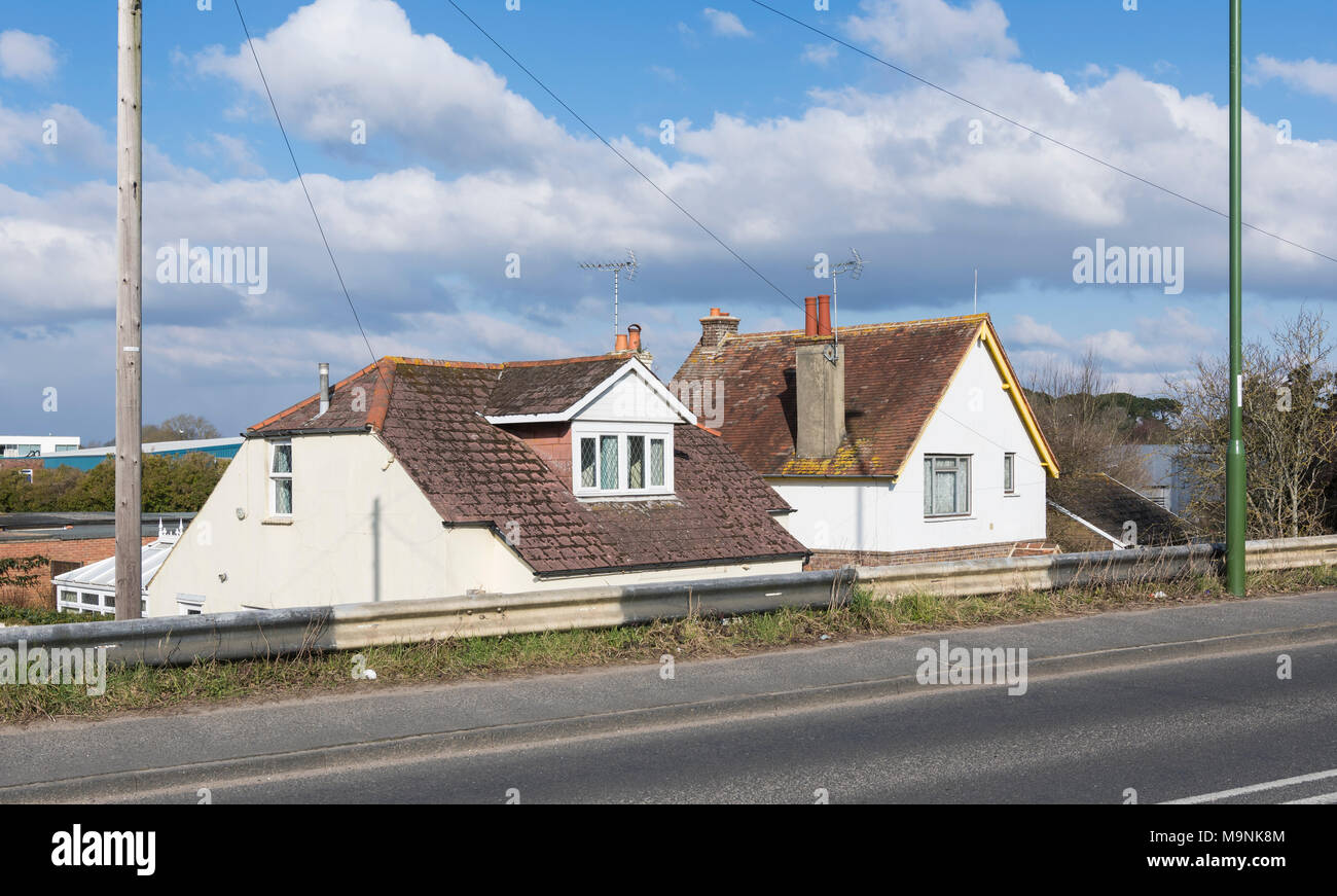 House roof showing where a home is built below the level of a road ...