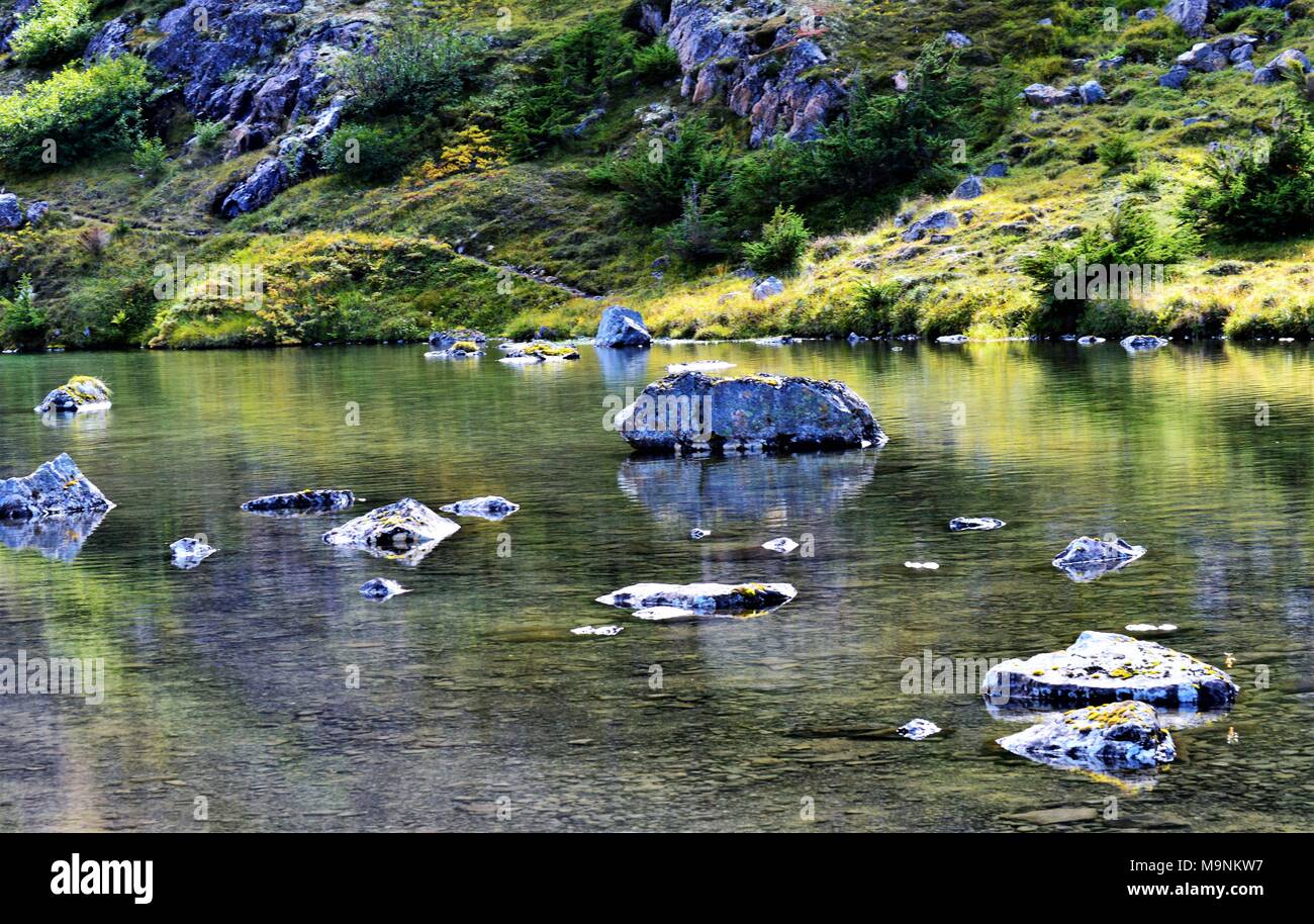 Rocks in Lake Stock Photo - Alamy