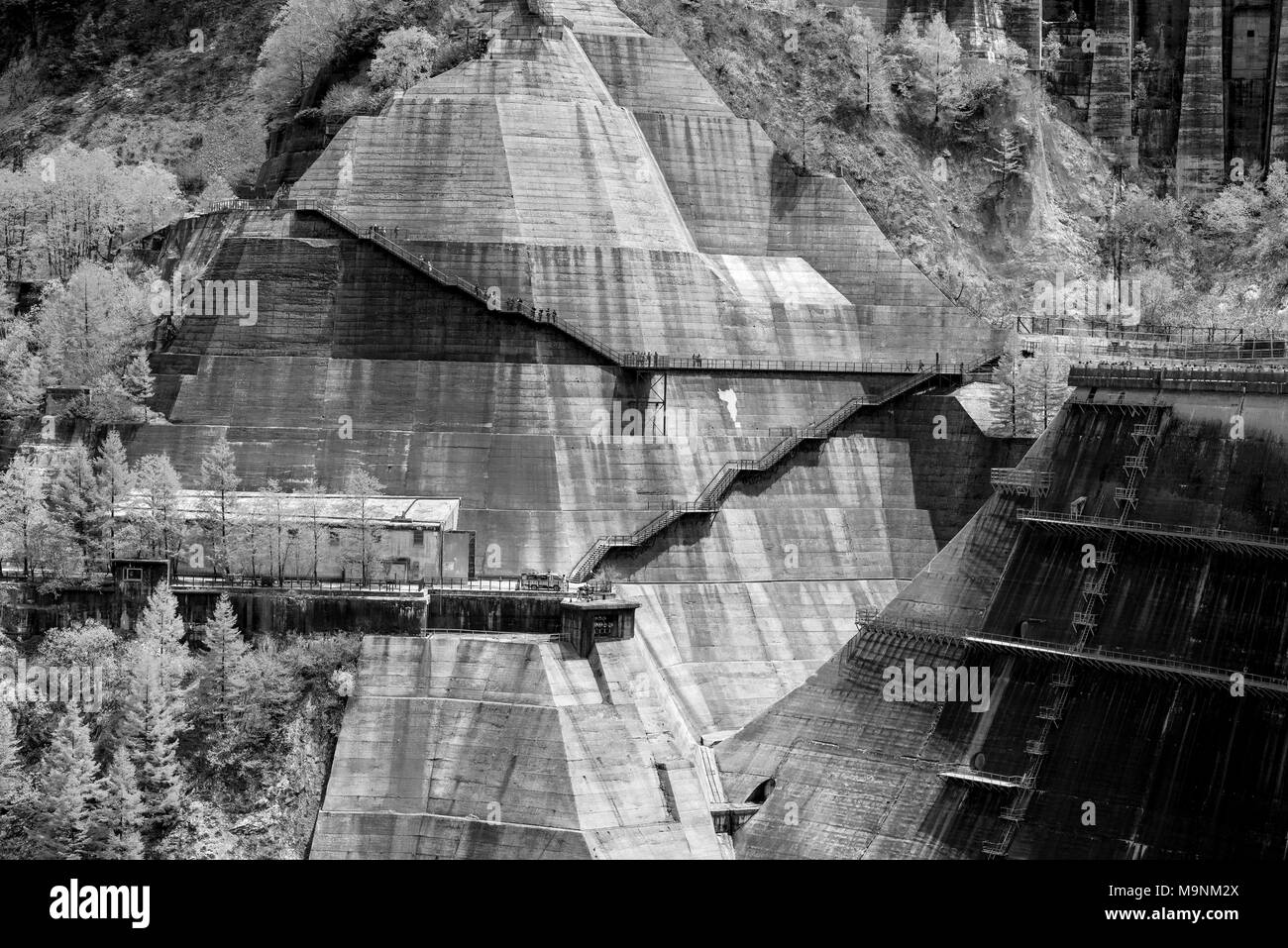 Abstract Kurobe Dam in monotone. The Kurobe Dam or Kuroyon Dam is a ...