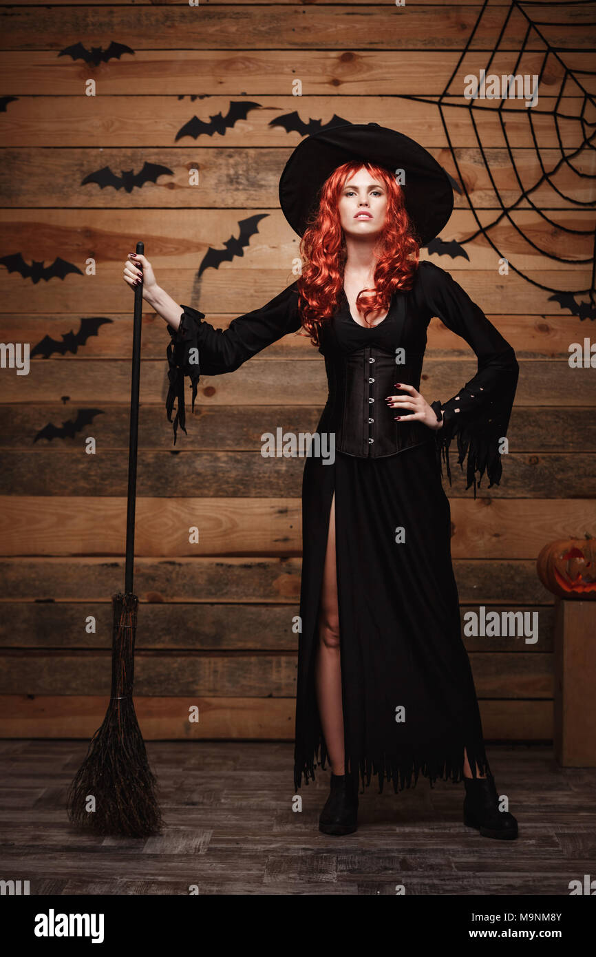 Halloween witch concept - Full-length Happy Halloween red hair Witch ...