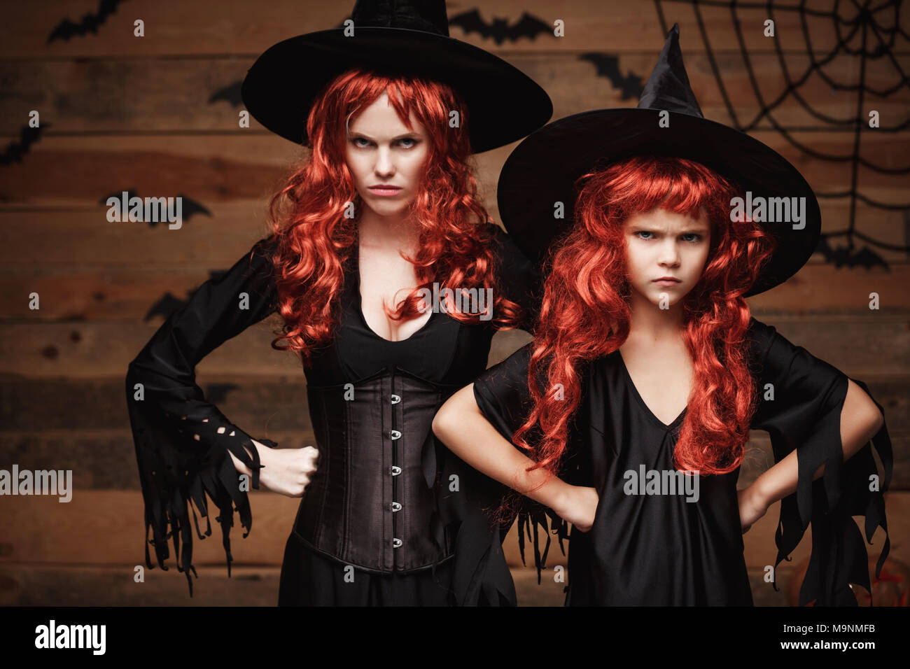 Halloween Concept - Beautiful caucasian mother and her daughter with ...