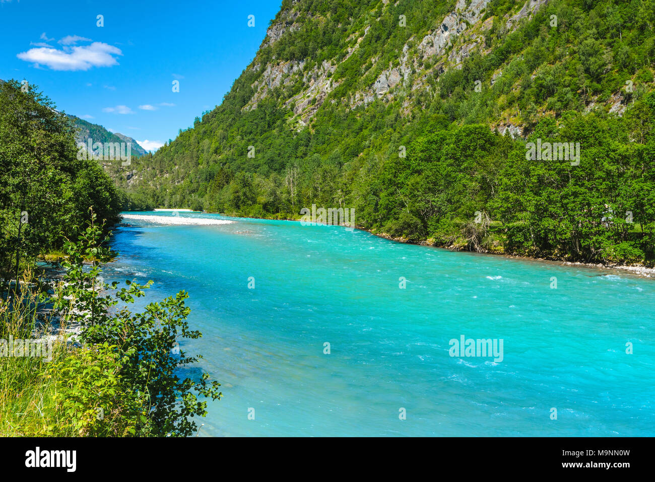 stream landscape with turquoise blue water of Nigardsbreen glacier ...