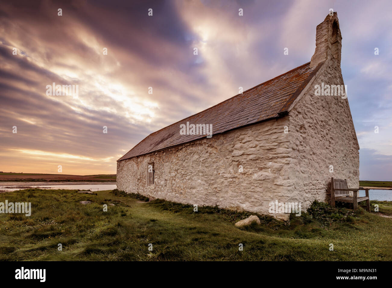 St. Cwyfans Church, the Little Church in the Sea, sits on the small ...