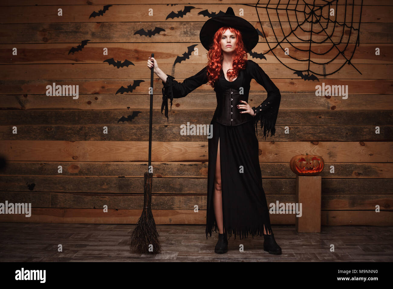 Halloween witch concept - Full-length Happy Halloween red hair Witch ...