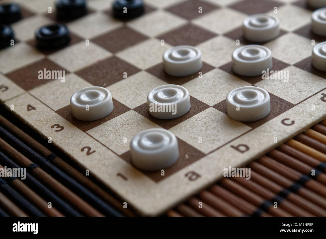 Checkers in checkerboard ready for playing. Game concept. Board game ...