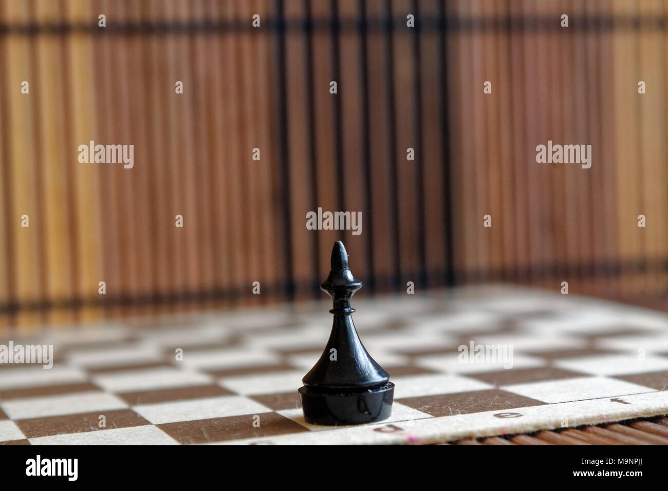 Wooden chess Board and plastic chess rook, on board Stock Photo - Alamy