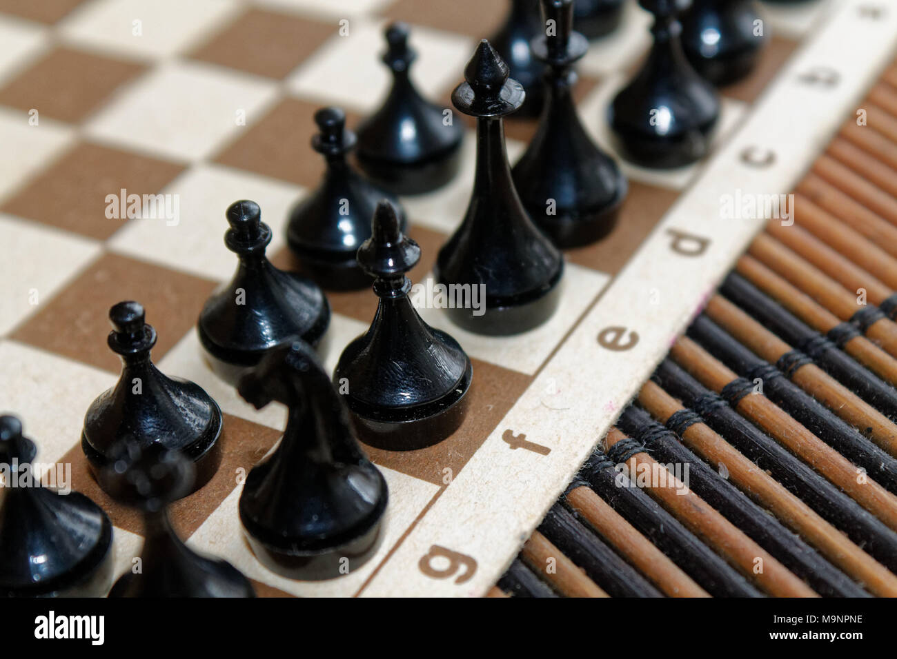 Magnetic Wooden Chess Board and steel chess pieces, isolated on board ...