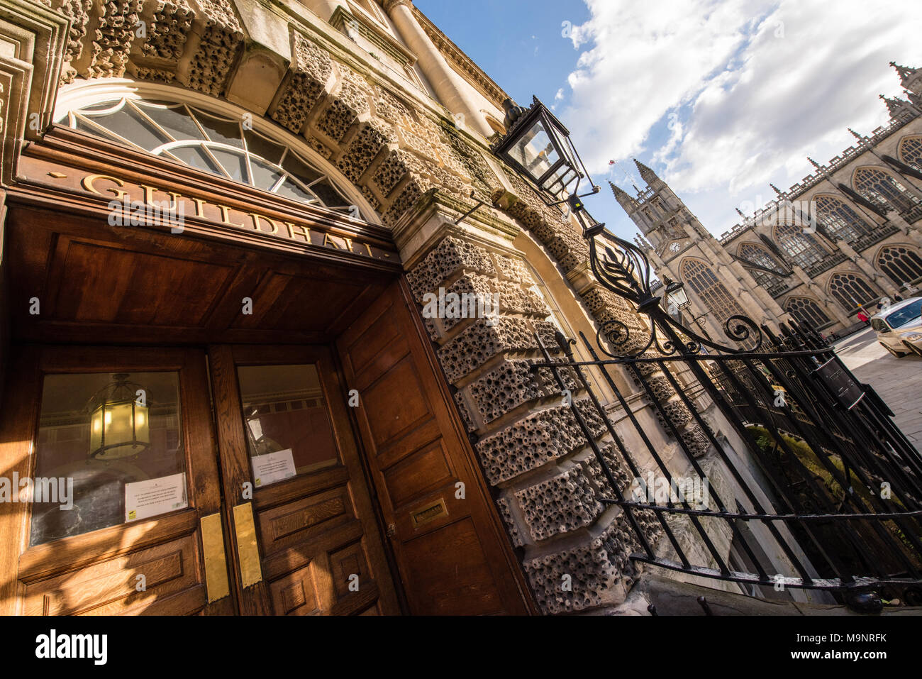 View of the entrance doors to the Guildhall in Bath with historic Bath ...