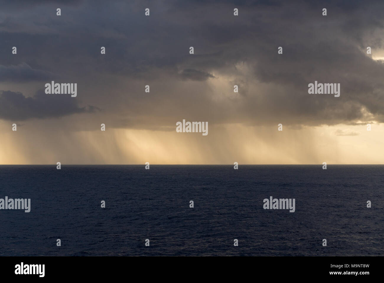 Rain over the Atlantic ocean from heavy storm clouds Stock Photo - Alamy