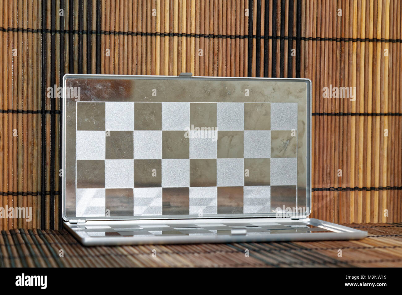 Photo with a picture of a steel chess Board. Metal board with ...