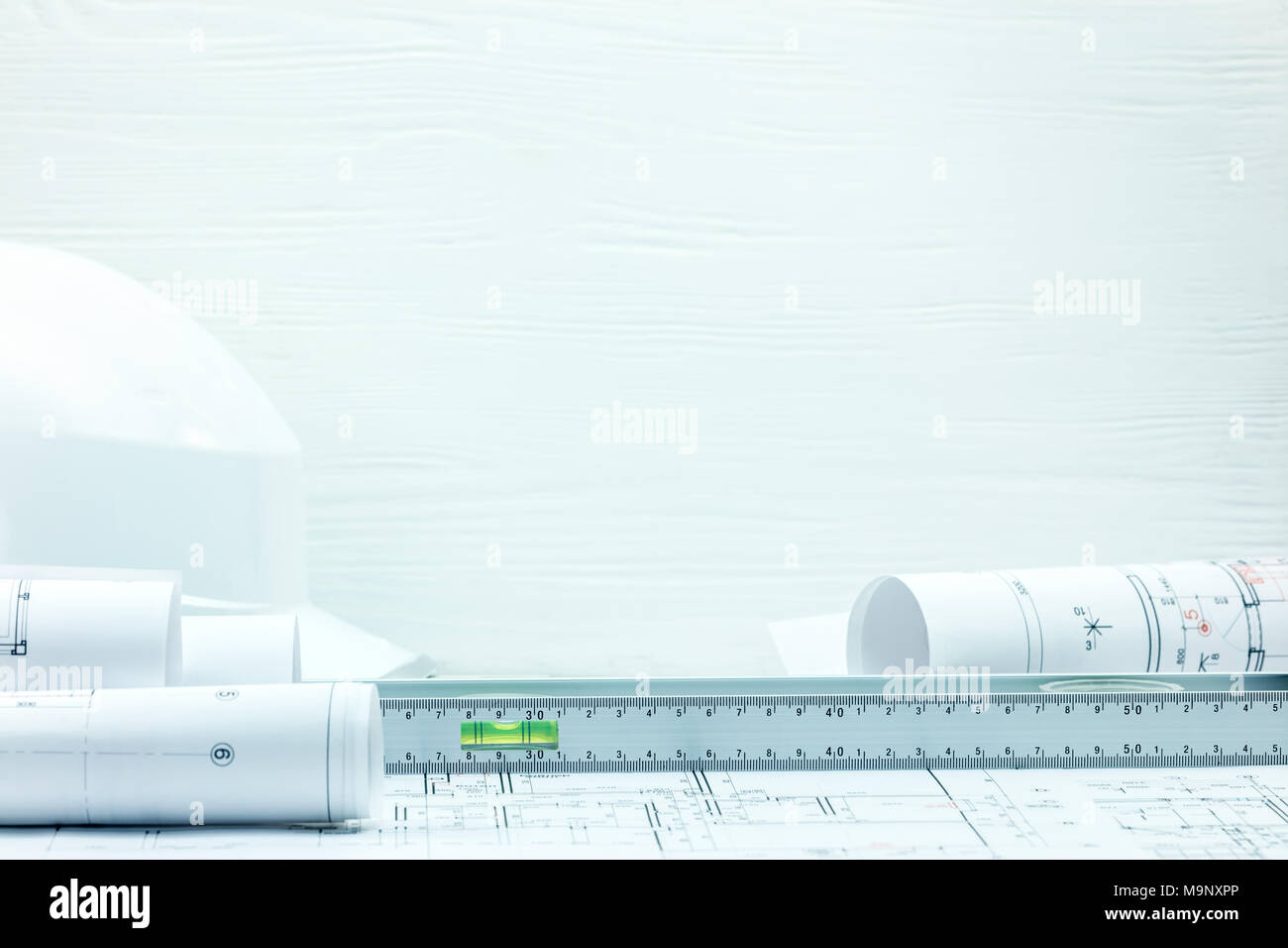 engineering project, blueprints, folding ruler and helmet on plans ...