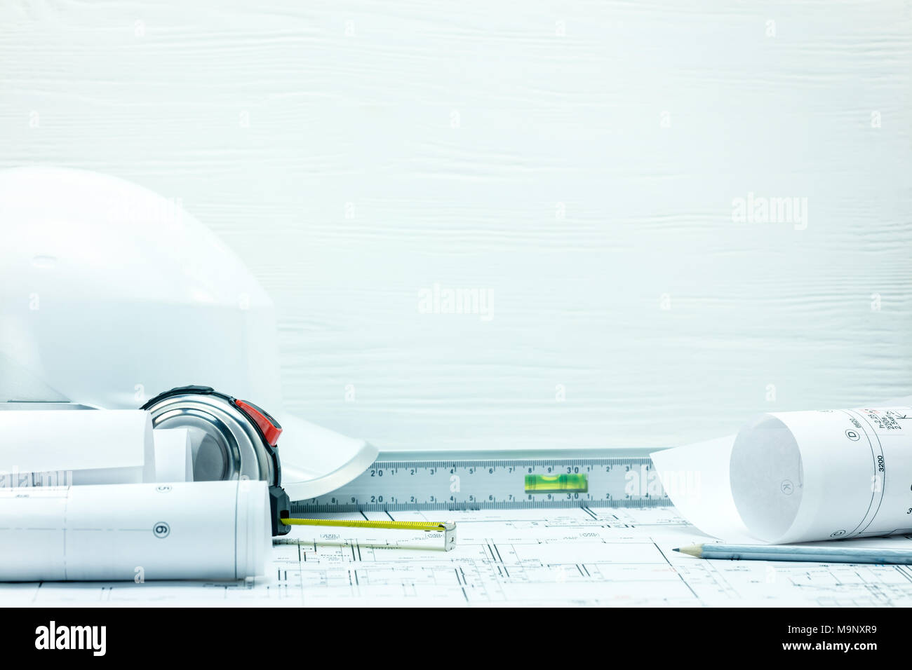 architects drawing and measuring tools and instruments on table with ...