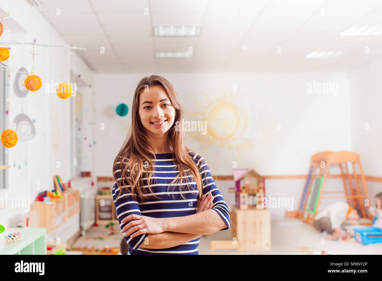 Portrait of teacher in a Waldorf kindergarten Stock Photo - Alamy