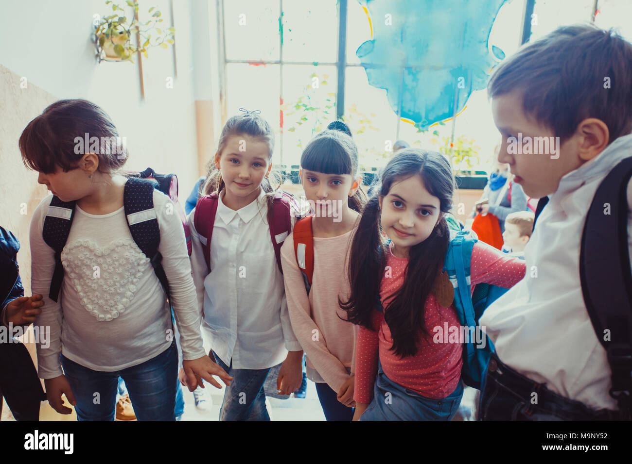 Schoolchildren walking school corridor hi-res stock photography and ...