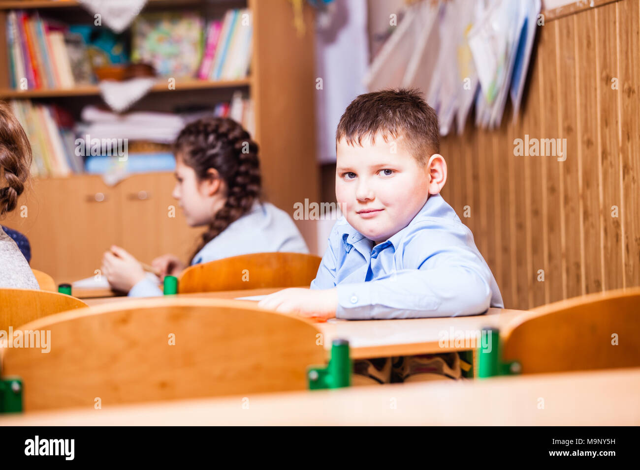 Children talking together and classroom hi-res stock photography and ...