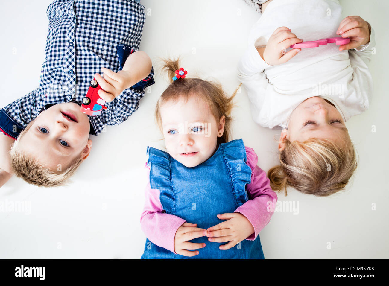 The children are posing isolated Stock Photo - Alamy