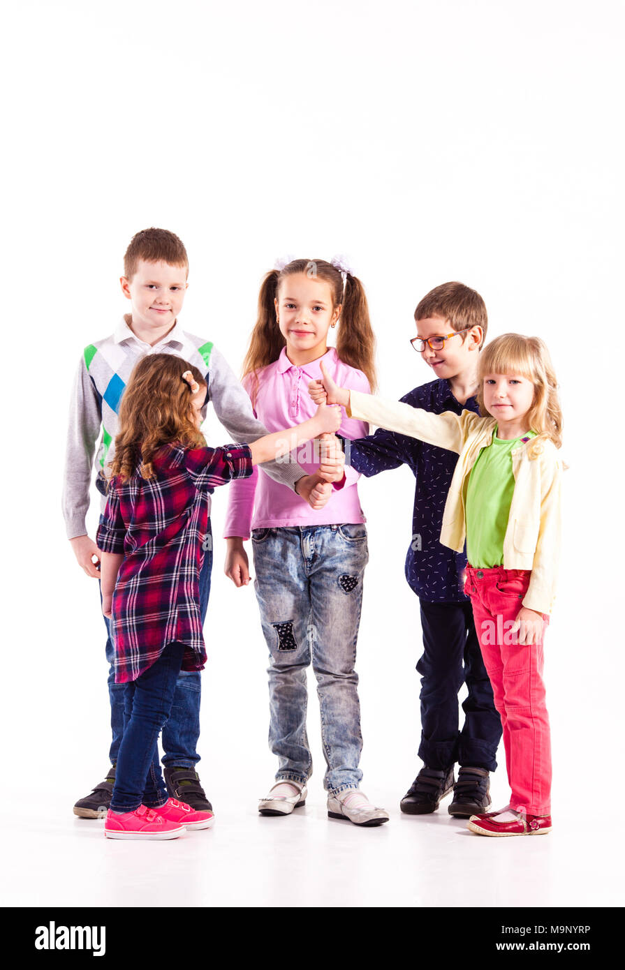 Children with raised hands Stock Photo - Alamy