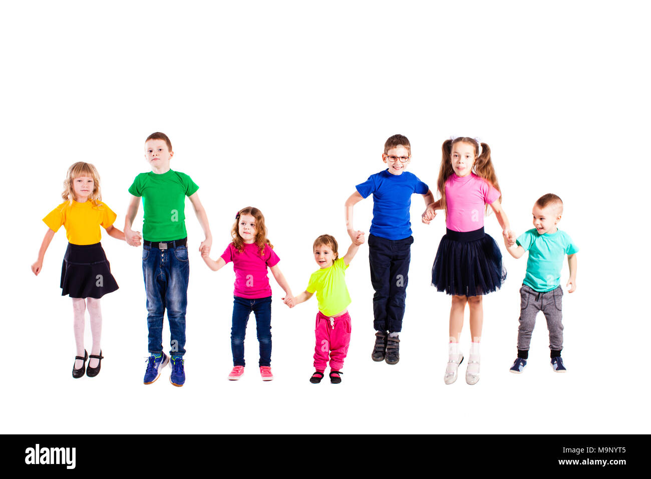 Funny jumping kids isolated Stock Photo - Alamy