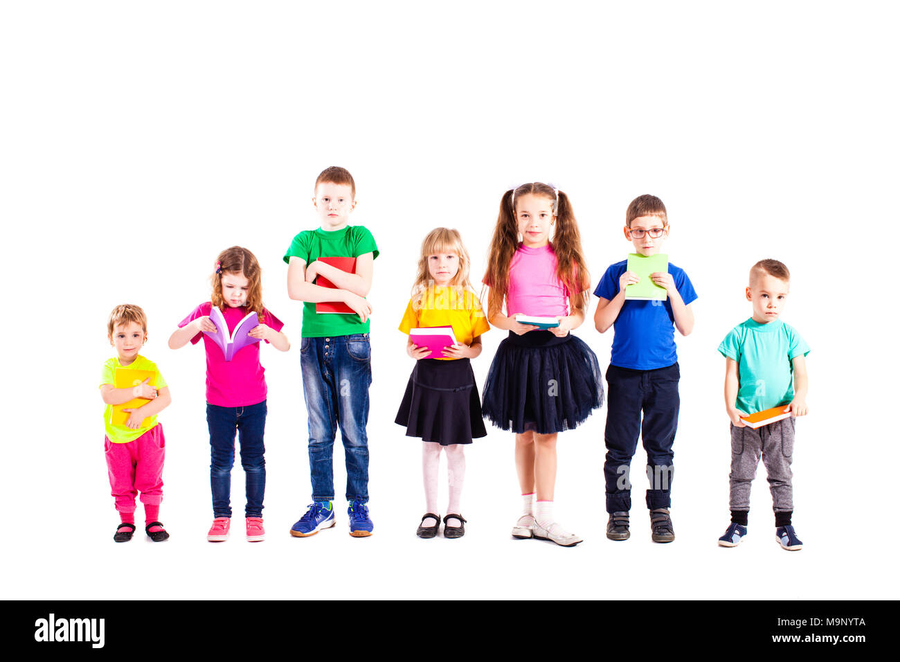 Smart children with books Stock Photo - Alamy