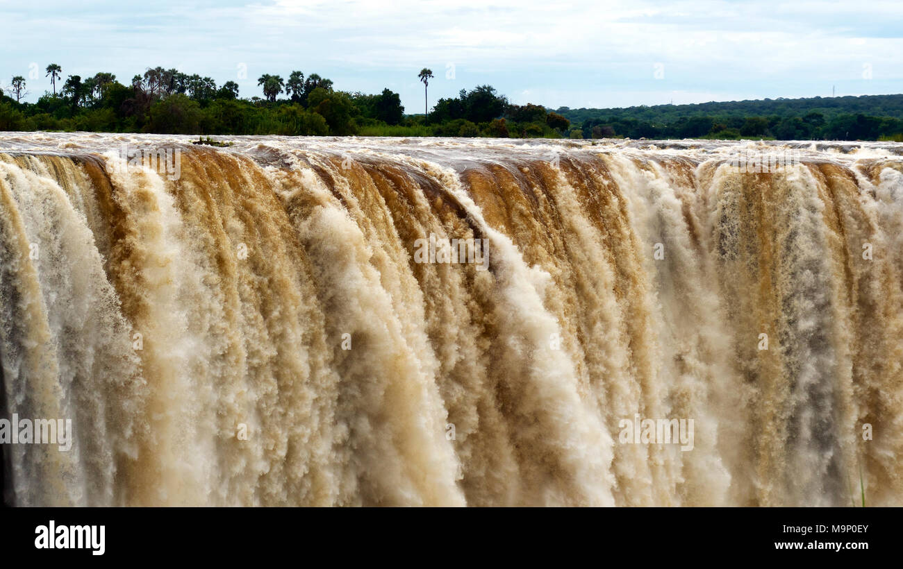 Millions of litres of Zambezi River water cascading down the Victoria ...