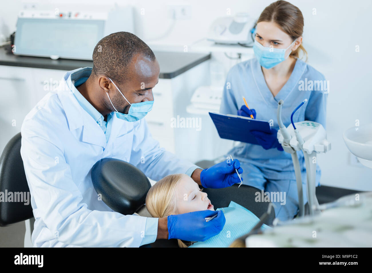 Hospital nurse making notes hi-res stock photography and images - Alamy