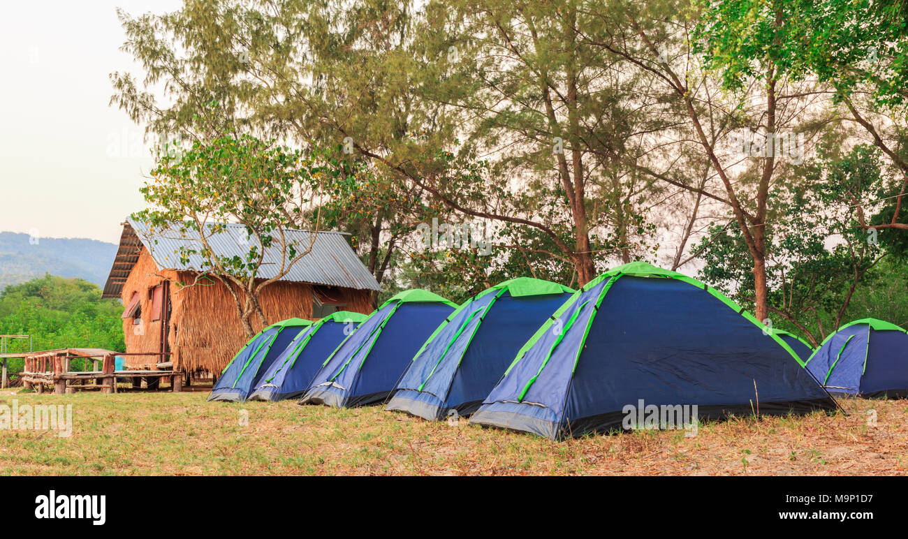 Tents and straw hut Stock Photo - Alamy