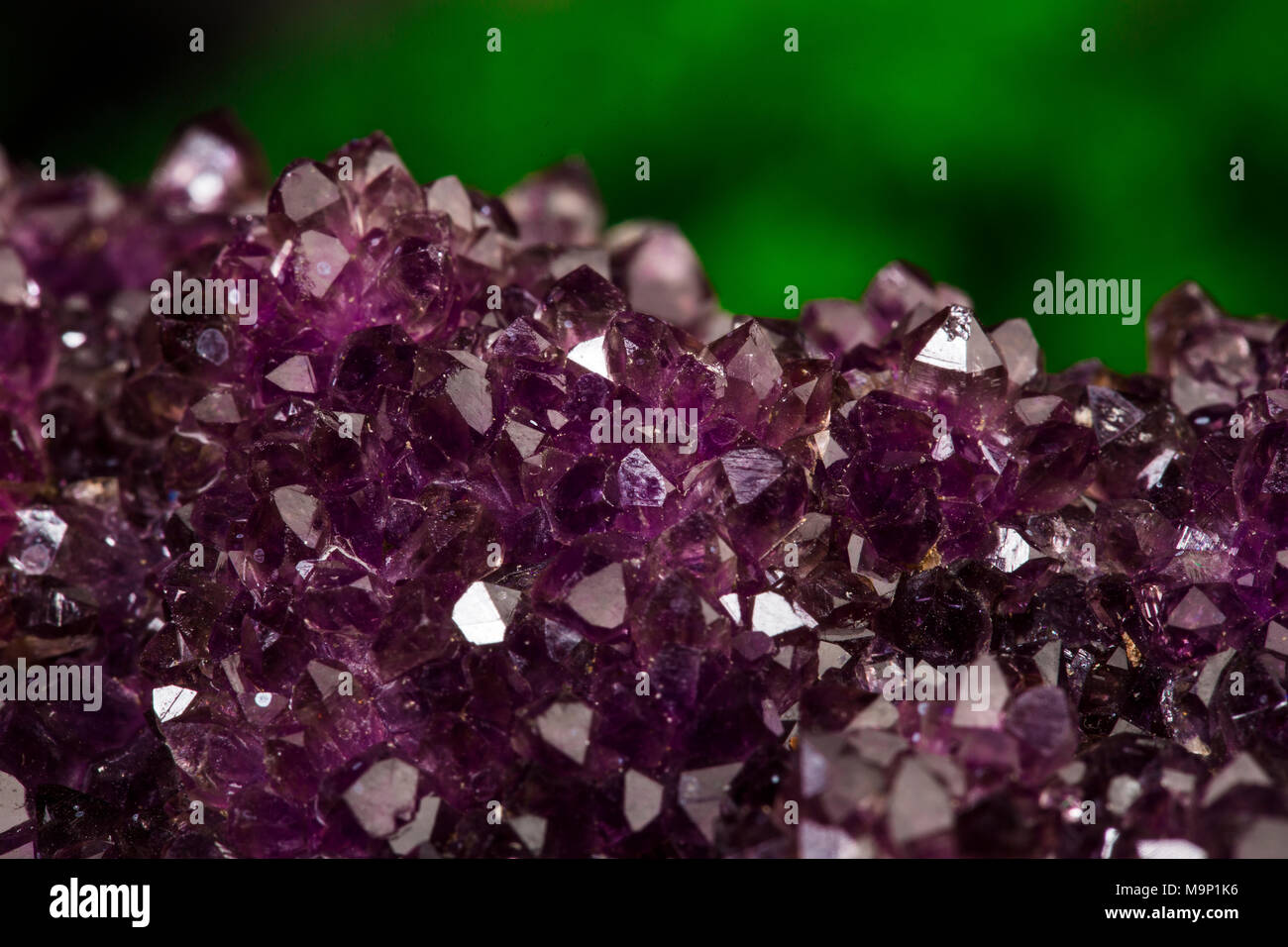 Amethyst geode on black background. Beautiful natural crystals gemstone ...