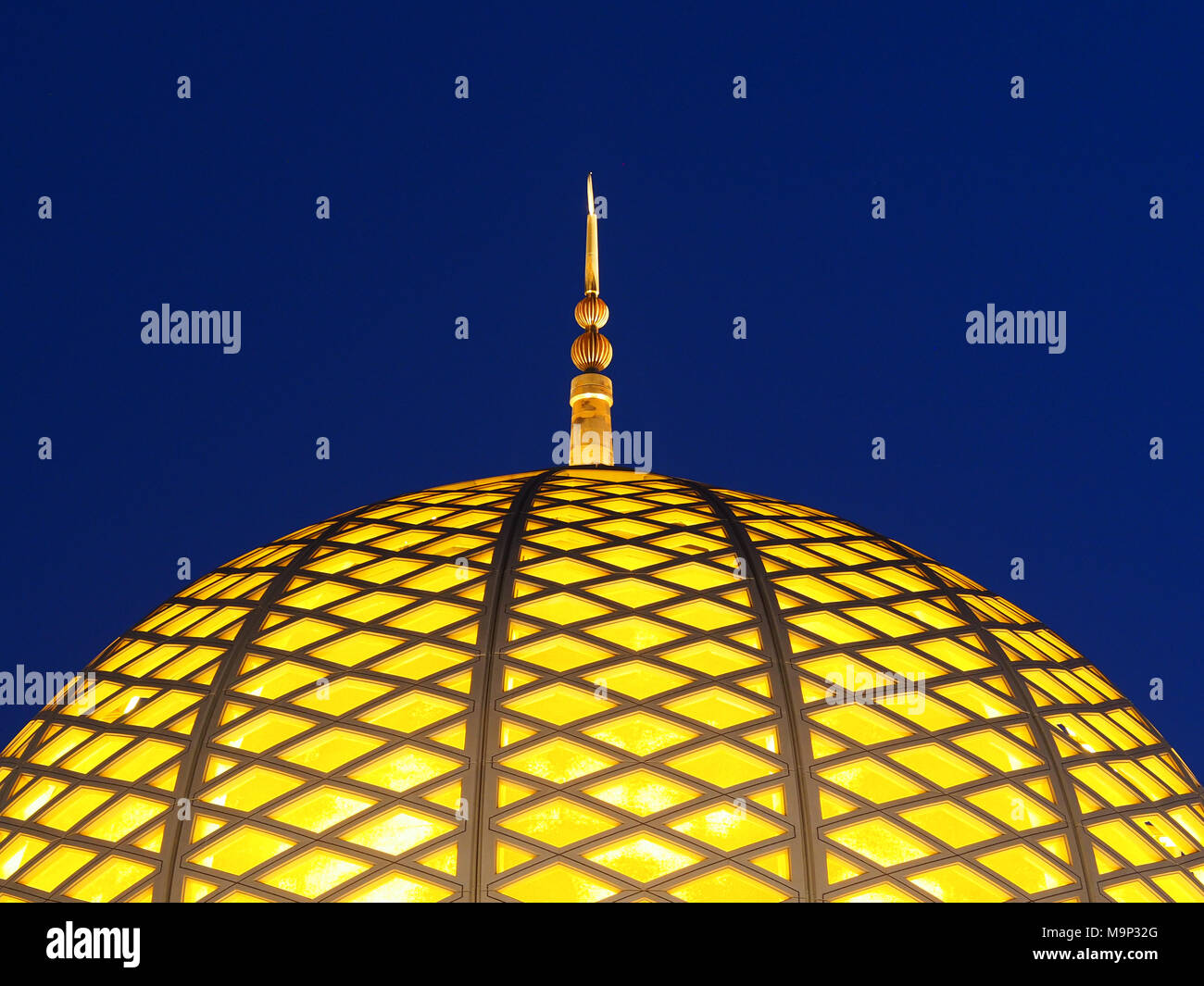 Illuminated dome of the Great Sultan Qabus Mosque at night, Muscat ...