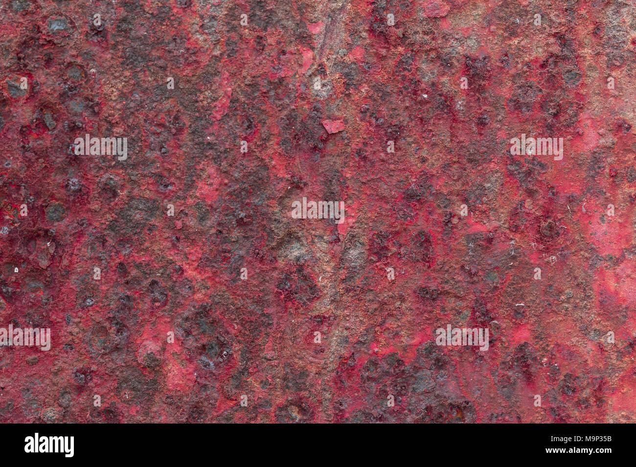 Red painted metal with rust texture Stock Photo - Alamy