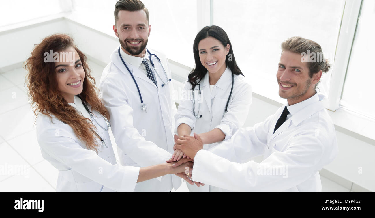 friendly team of doctors shows their success Stock Photo - Alamy
