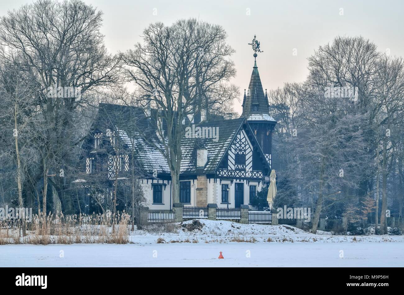 Beautiful historic castle in a winter scenery. Historic Hunting Palace ...