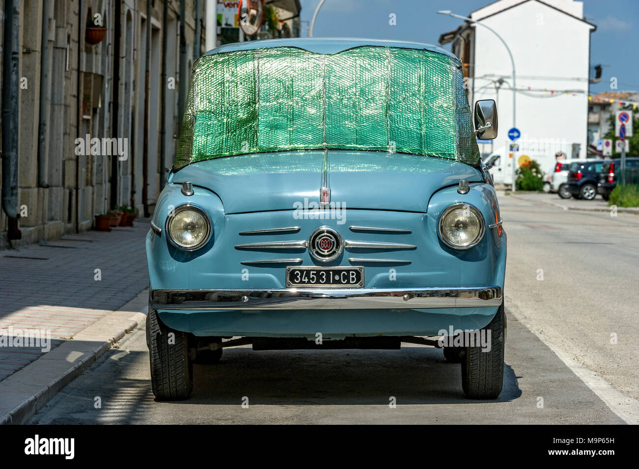 Blue FIAT 600, Seicento,oldtimer, with sun protection on windscreen ...