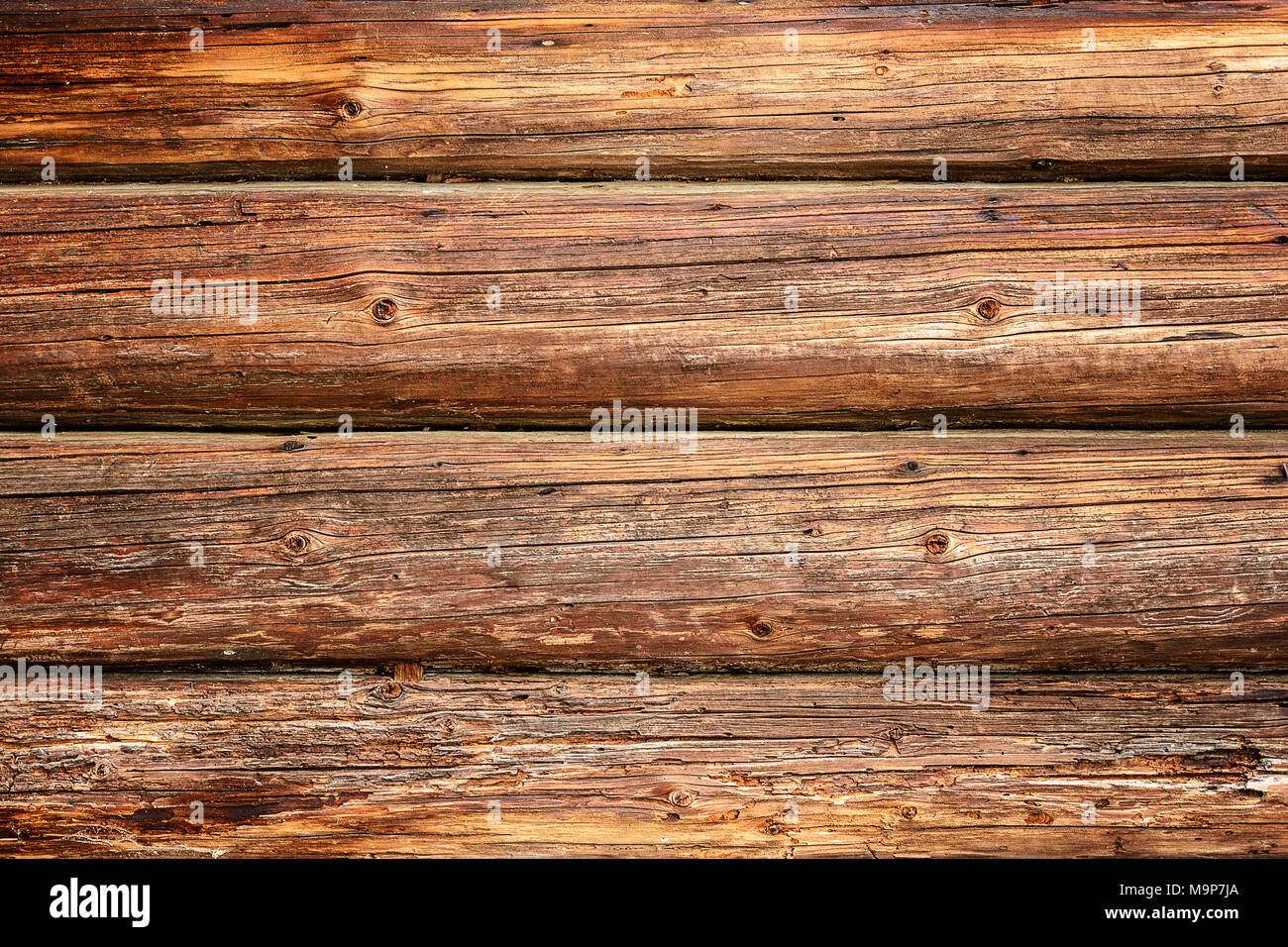 Magnificent background of a textured old wall made of brown wooden ...