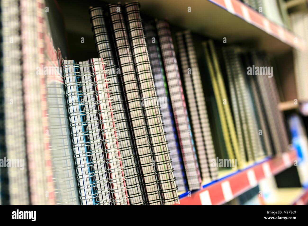 Group of Notebooks in a library Stock Photo - Alamy