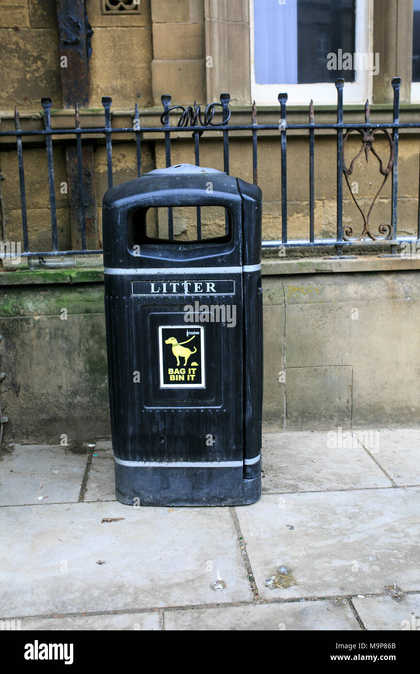 Black vintage litter in the street Stock Photo - Alamy