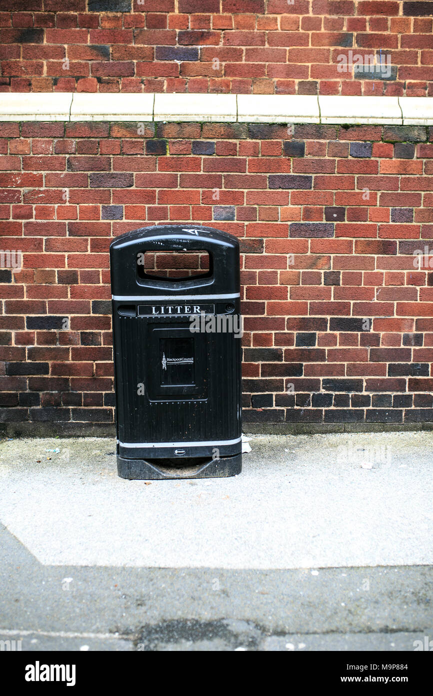 Black vintage litter in the street Stock Photo - Alamy