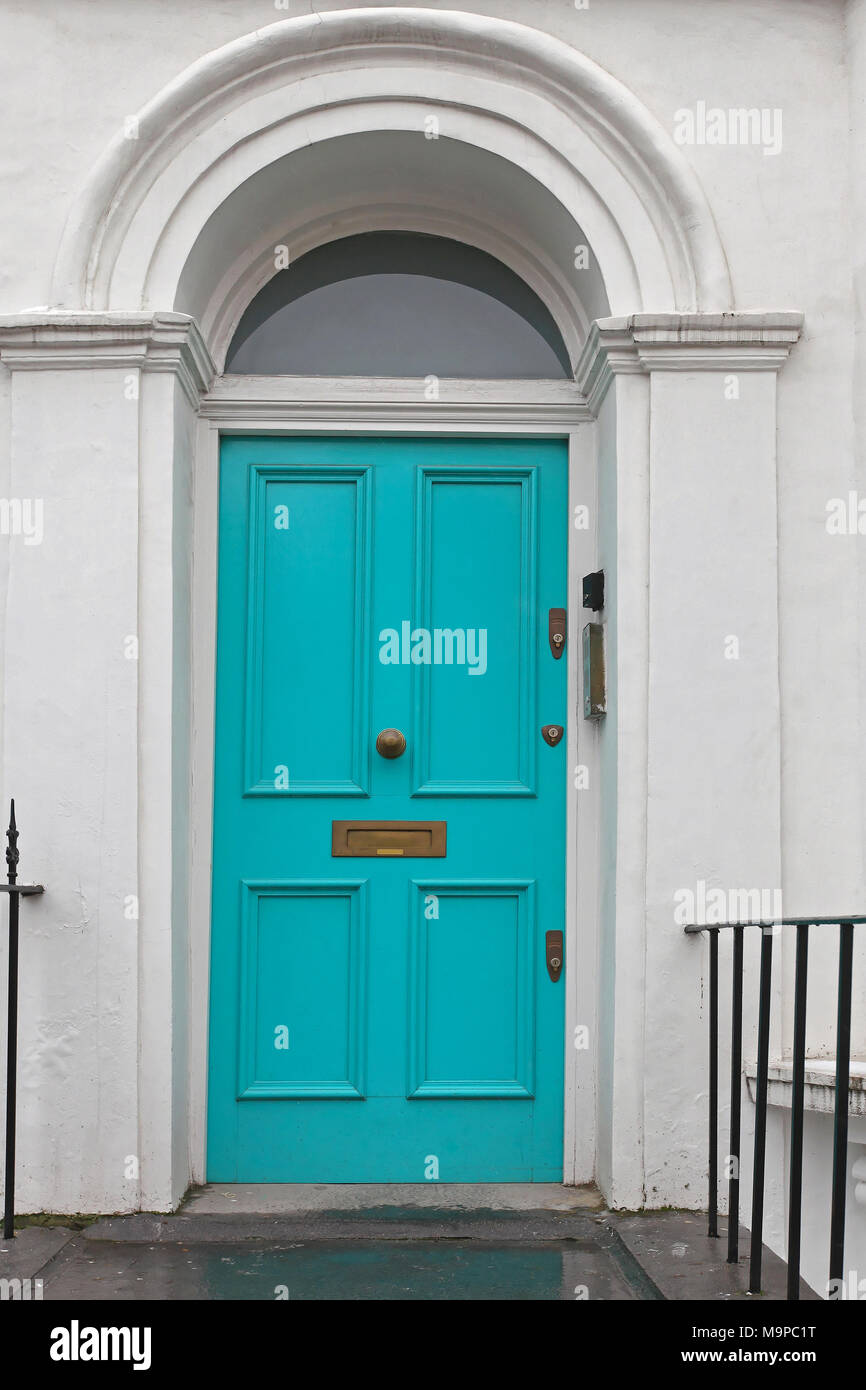 Turquoise Entrance Door With Arch at House in London Stock Photo - Alamy