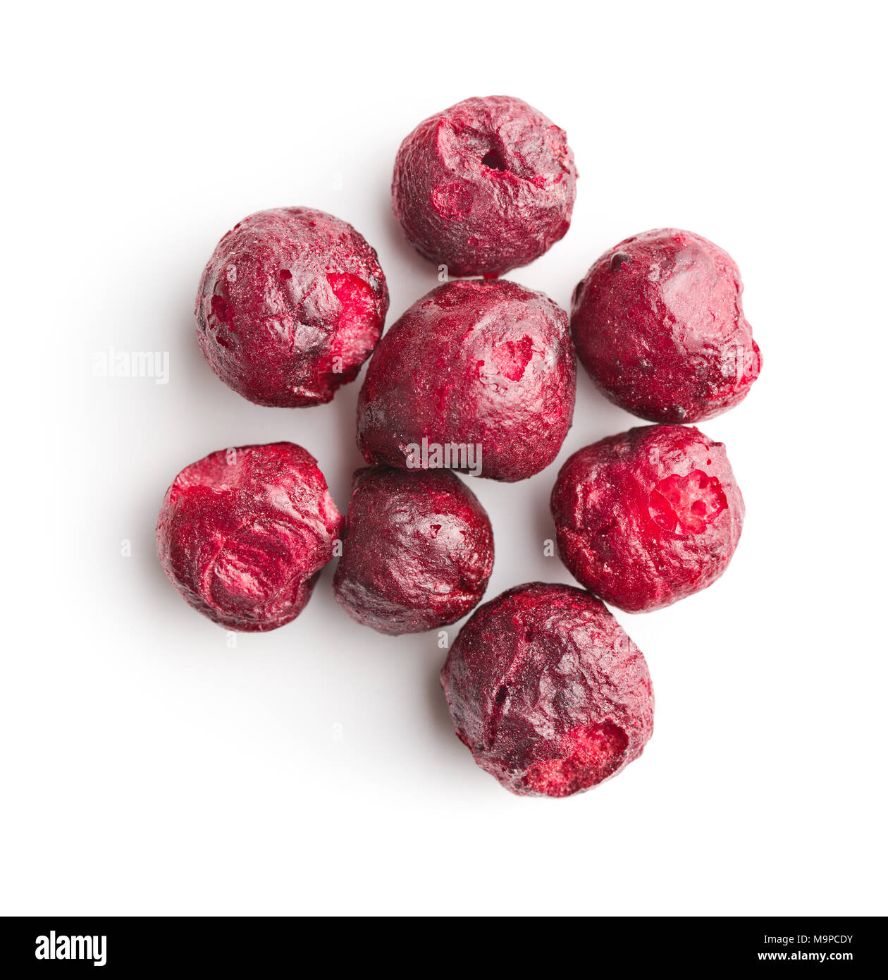 Freeze dried cherries isolated on white background Stock Photo - Alamy