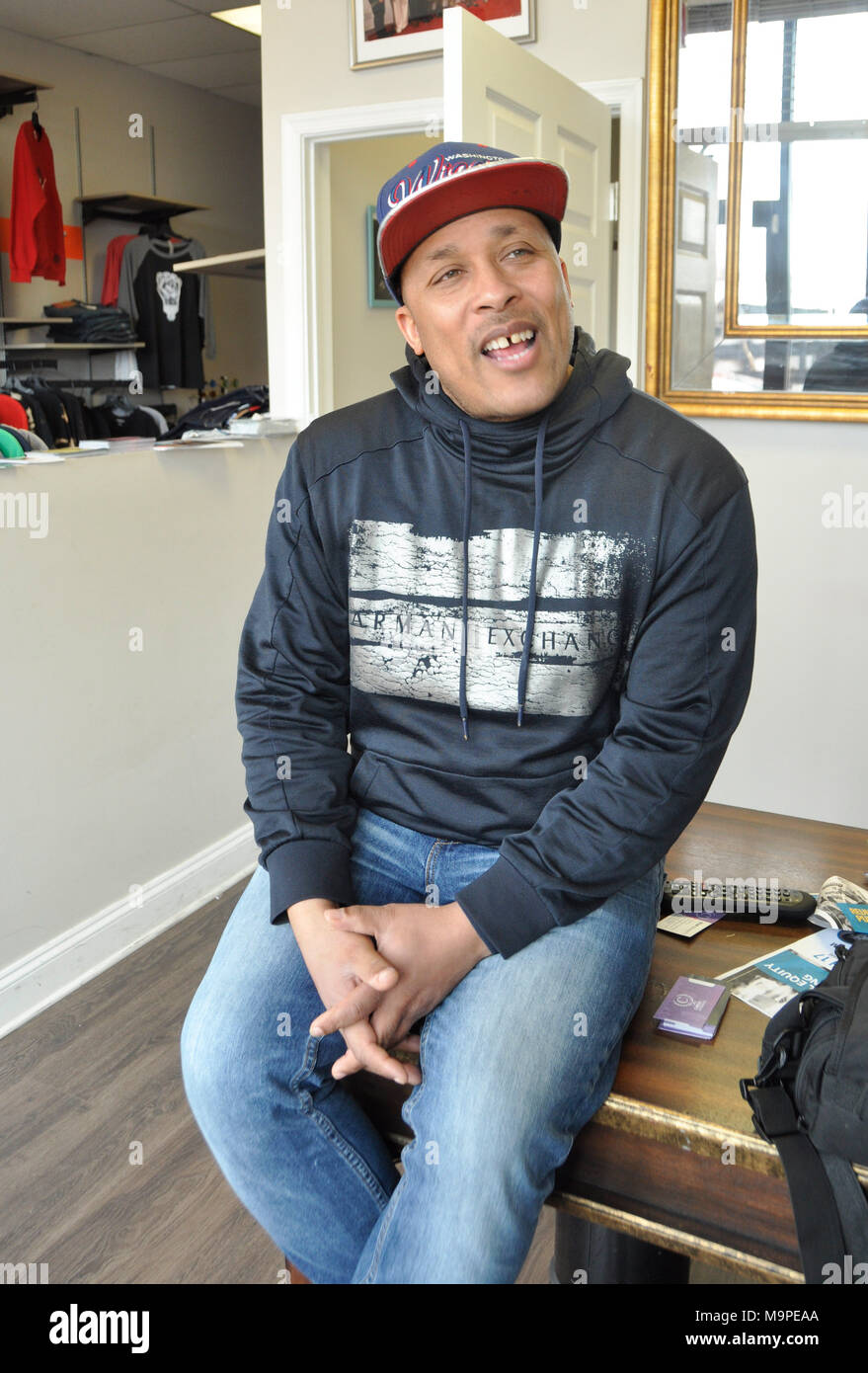 14 March 2018, USA, Washington: Ronald Moten siting in a shop in ...