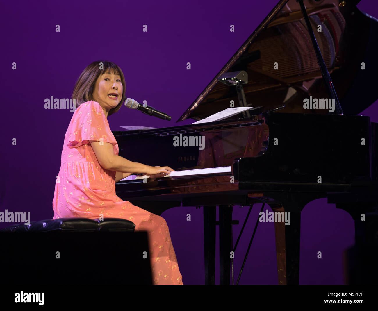 Akiko Yano performs at the piano at the Cherry Blossom Festival Opening ...