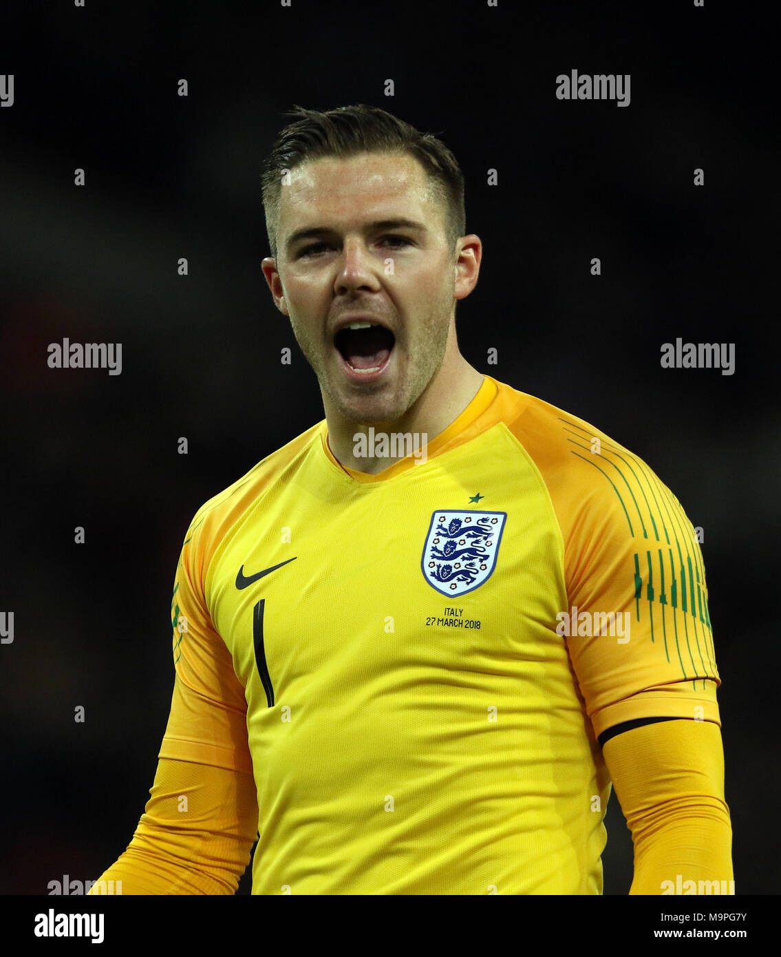 London, UK. 27th March, 2018. Jack Butland (E) celebrates the first ...