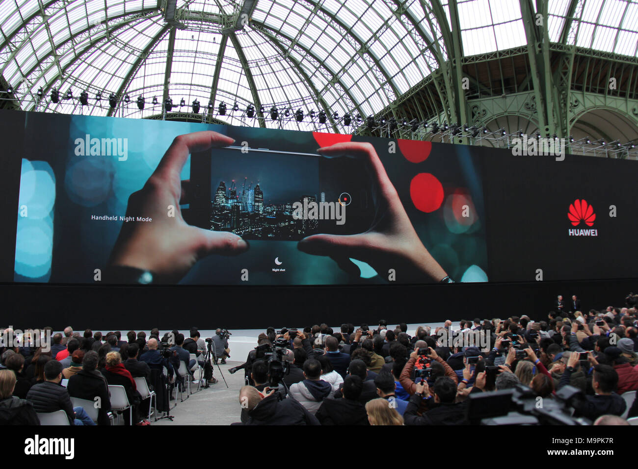 Paris, France. 27th Mar, 2018. Guests and the media attend the ...