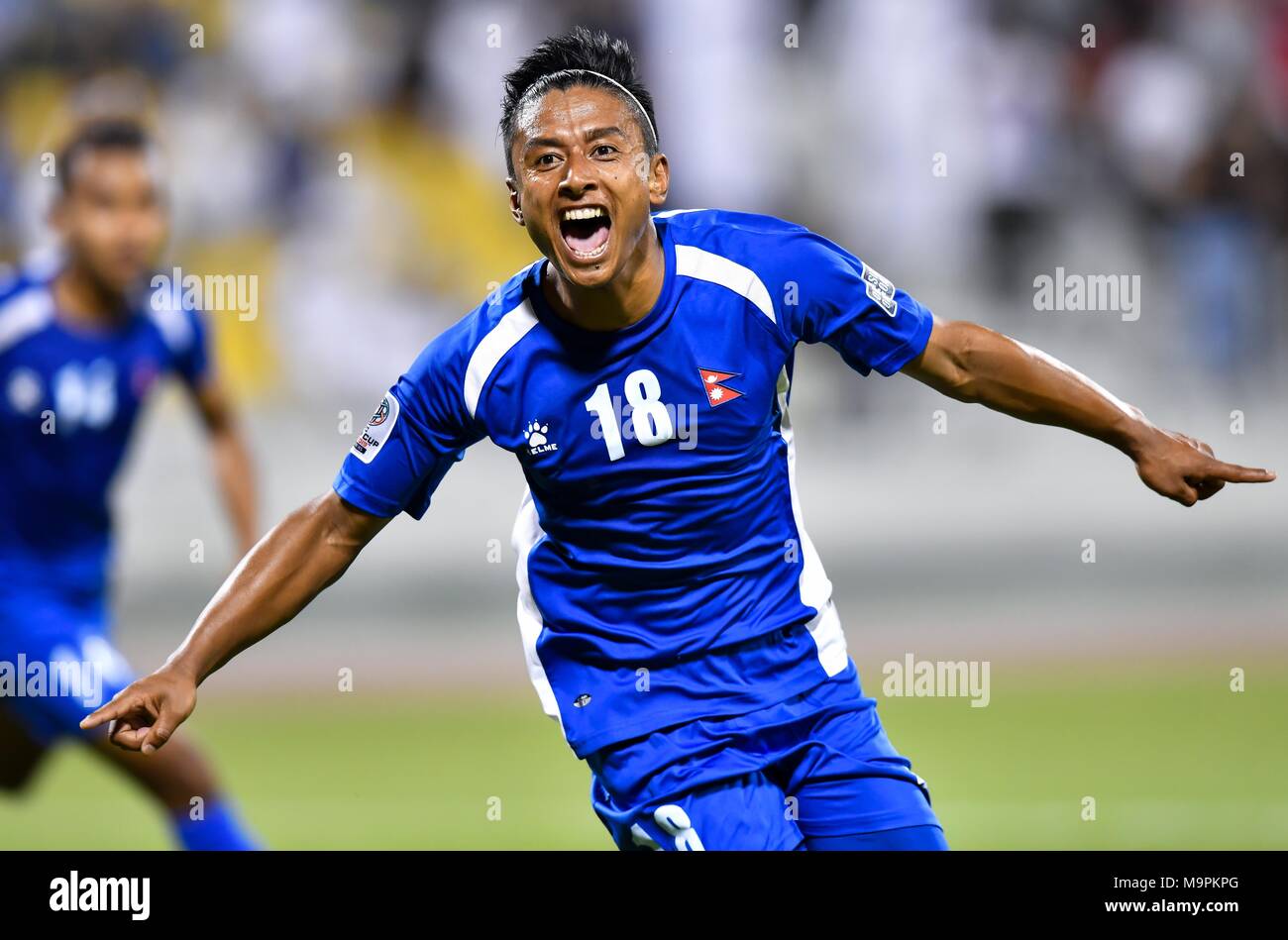 Doha, Qatar. 27th Mar, 2018. Nawayug Shrestha of Nepal celebrates ...
